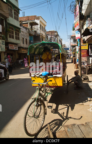 Varanasi, India. School bus in Traffic in Banaras. School bus carries a ...