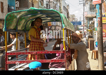 Bicycle cart school bus in Varanasi, India Stock Photo - Alamy