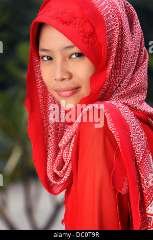 Muslim Girl in a red outfit Stock Photo - Alamy