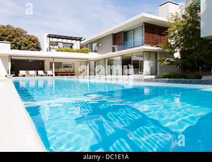 Modern house and lap pool Stock Photo - Alamy