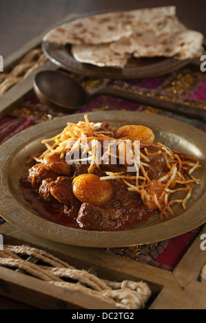 Sali Jardaloo boti. Lamb with apricots and potato straws India Food ...