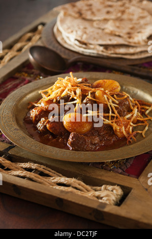 Sali Jardaloo boti. Lamb with apricots and potato straws India Food ...
