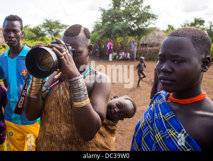 Bodi tribe fat man taking a bath before the Kael ceremony, Omo valley ...