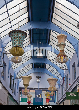 Flags from various countries at the refurbished Brixton Market, a ...