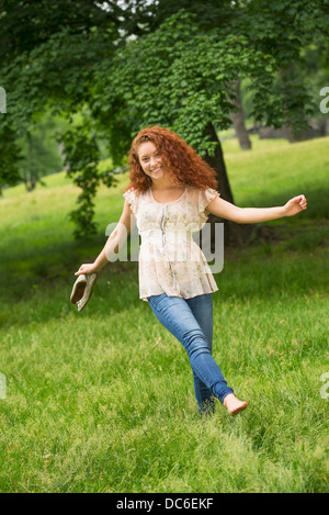 Young hispanic woman holding shoe insole at physiotherapy clinic ...