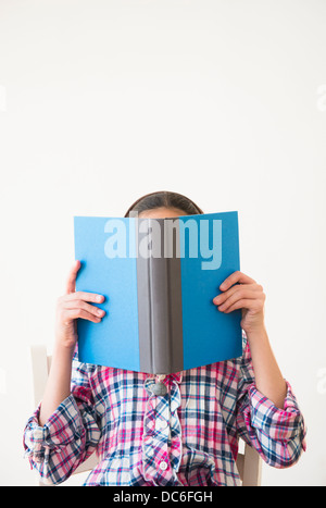 kid girl with open book Stock Photo - Alamy