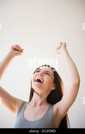 A victorious woman Stock Photo - Alamy
