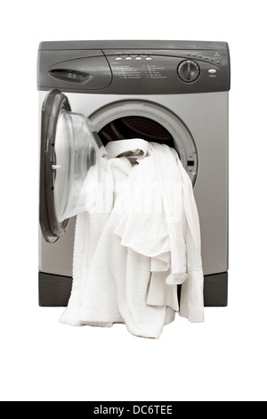Washing machine overflowing with clothes Stock Photo - Alamy