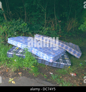 Pile of Dumped Mattresses, UK Stock Photo - Alamy
