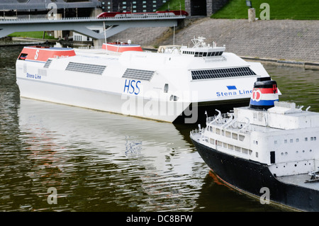 Stena Line HSS Discovery passenger ferry passing a container ship in ...