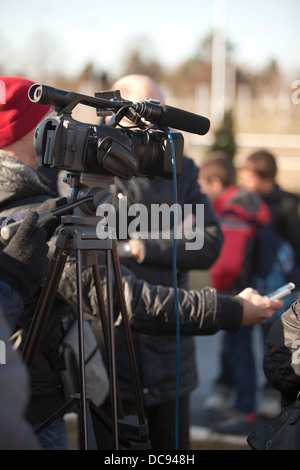 capturing event with professional video camera Stock Photo - Alamy