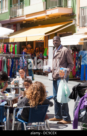 African street seller trader vendor selling goods, Piazza della Rotonda ...