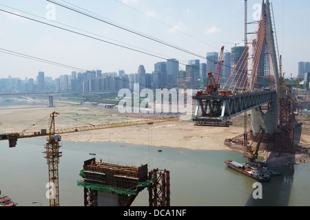 The Qiansimen Bridge under construction over the Jialing River in Stock ...