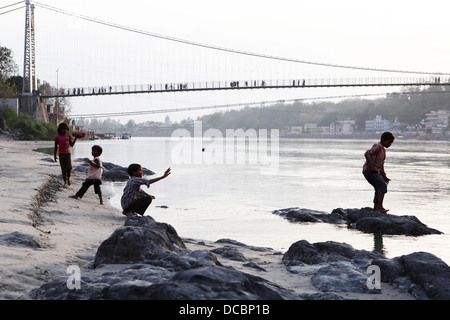Indian children playing in Ganges river at Varanasi Stock Photo - Alamy