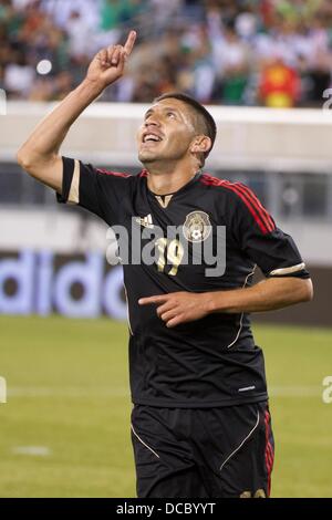 Forward Oribe Peralta of Mexico celebrates his second goal of the match ...