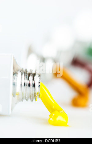 Acrylic blue paint tubes with smears, isolated on a white background ...