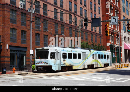 MTA Penn Shuttle light rail train waiting at road junction, Baltimore ...