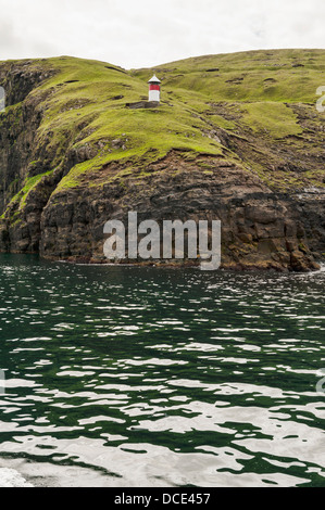 Small red and white lighthouse by fjord, Narvik, Arctic Norway Stock ...