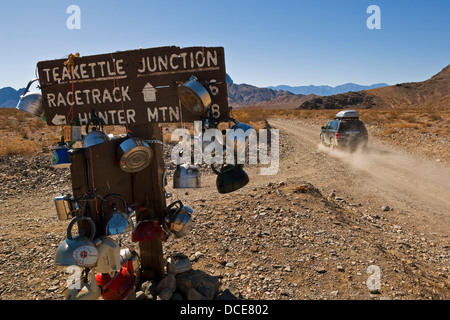 Road sign at Teakettle Junction on Racetrack Valley Road, Mojave Desert ...