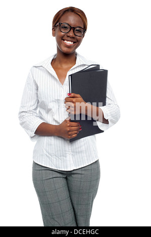 Female representative posing with file folder Stock Photo - Alamy
