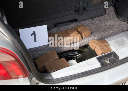 illegal drug trade in the trunk of a car Stock Photo - Alamy