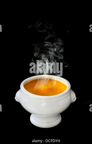 Pumpkin Soup isolated on black background side view Stock Photo - Alamy