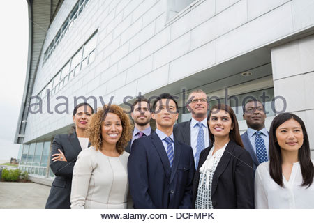 Team building and togetherness. Business people stretched out their ...