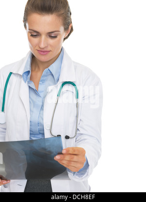Thoughtful doctor woman checking fluorography Stock Photo - Alamy