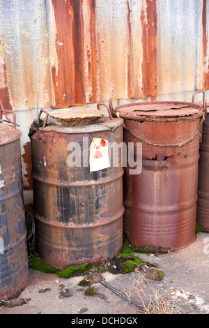 Rusty barrel with a radiation warning symbol Stock Photo - Alamy