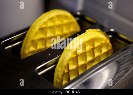 Two Kellog's Eggo breakfast waffles in a toaster Stock Photo - Alamy