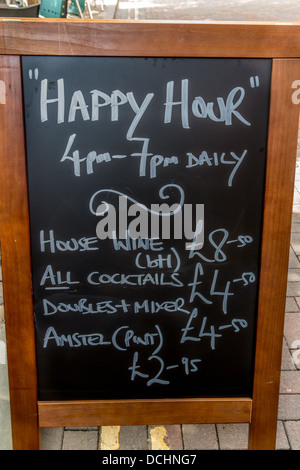 Happy Hour blackboard outside a bar in the historic Old Market district ...