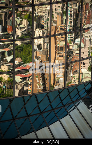 Reflections of the city of Taipei, Taiwan as seen in the windows of a ...