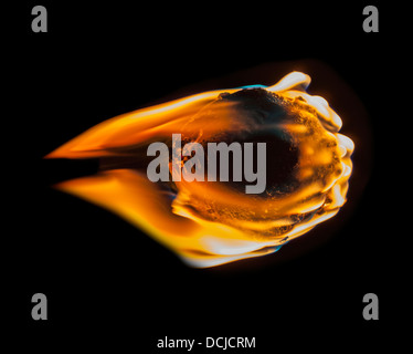 Flaming fireball fastball baseball burning into darkness Stock Photo ...