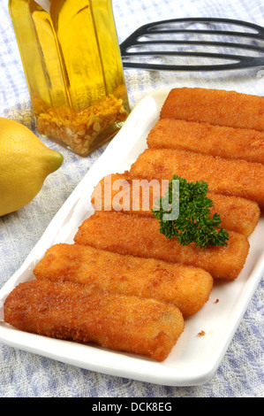 fried fish sticks on a white plate Stock Photo - Alamy