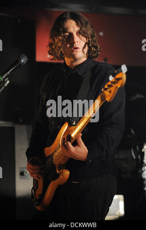 Nick O'Malley of The Arctic Monkeys performing at Revolution Live Fort ...