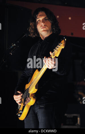 Nick O'Malley of The Arctic Monkeys performing at Revolution Live Fort ...
