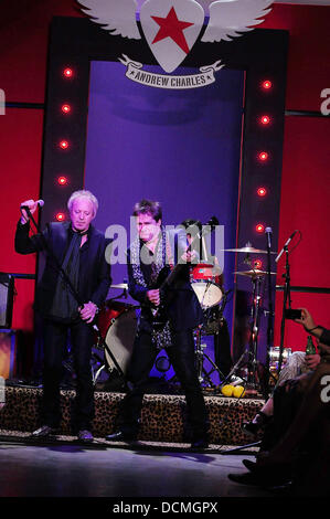 Jimmy Kunes, drummer Marky Ramone and Andy Hilfiger performs after his ...