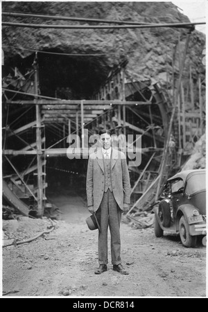 Ray Lyman Wilbur, Secretary of the Interior, is shown with the first ...