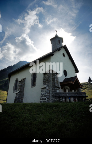 The Graydon chapel at the foot of the Roc d'Enfer mountains, surrounded ...