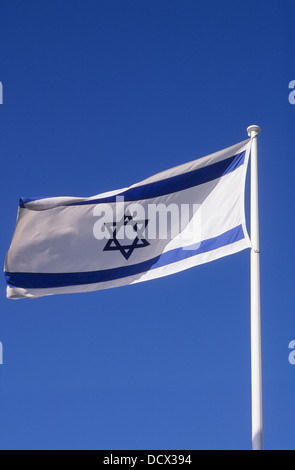 Israeli blue and white flag bunting fluttering against a backdrop of ...