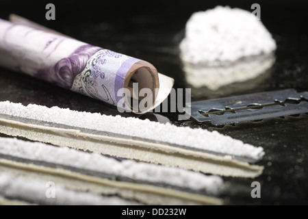 Drug addiction lines rows of powdered cocaine ready to be snorted ...