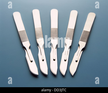Sharp knife on blue background Stock Photo - Alamy