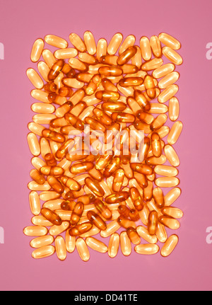 Fish oil capsules and different pills on white background Stock Photo ...