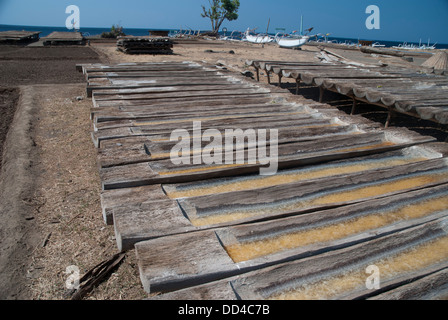 Production of sea salt in the Bali,Indonesia. Salt crystallizes out of ...