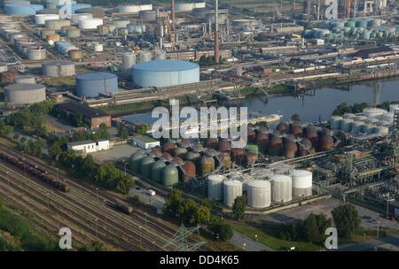 A view of the Tamoil Holborn refinery is pictured at the harbour of ...