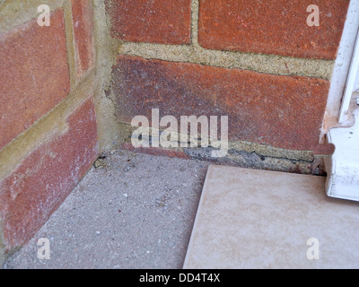 Bad brickwork badly laid bricks Stock Photo - Alamy