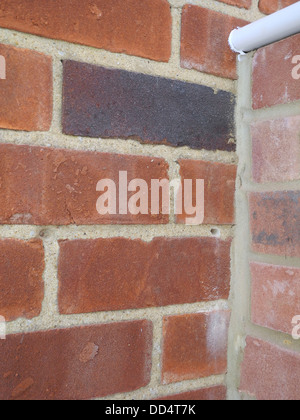 Bad brickwork badly laid bricks Stock Photo - Alamy