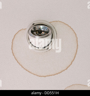 Watermark stain on ceiling where water has been leaking onto and around ...