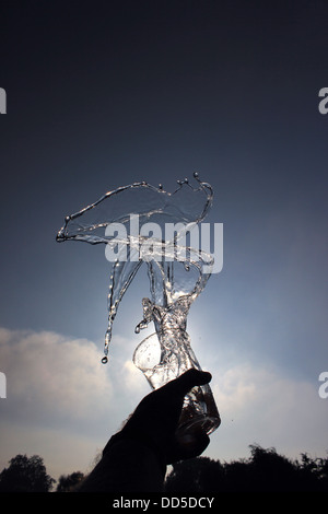 Water splashing from pint glass Stock Photo - Alamy