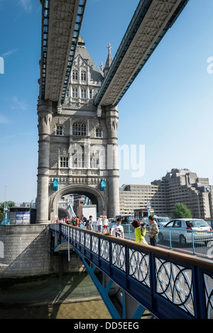 People walking across Historic London Bridge in London Stock Photo - Alamy
